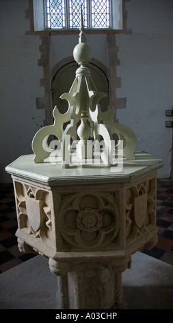 Fourteenth century baptismal font carved figures of an ecclesiastical ...