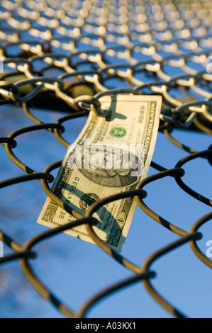 Money Stuck in Fence Stock Photo - Alamy