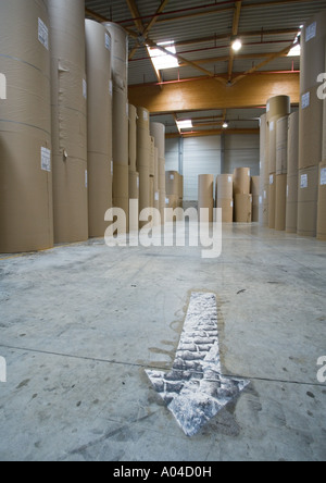 Paper rolls stacked in warehouse Stock Photo - Alamy