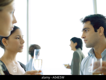 Business people glaring at each other Stock Photo - Alamy