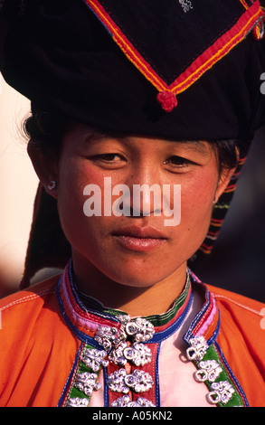 Portrait of a Tai Dam indigenous woman in a pink traditional dress ...