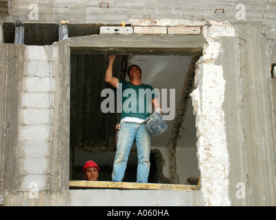 construction worker at a building site, employee in construction ...