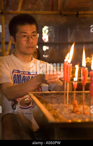 Praying. Man Mo Temple, in Hollywood Road,Hong Kong, China Stock Photo ...
