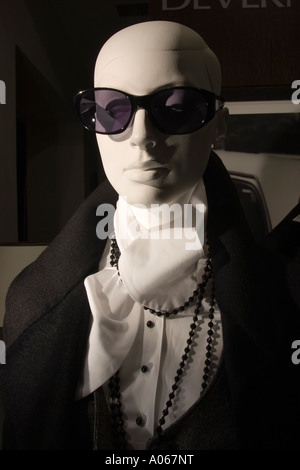 mannequin in fashion shop display window Stock Photo - Alamy
