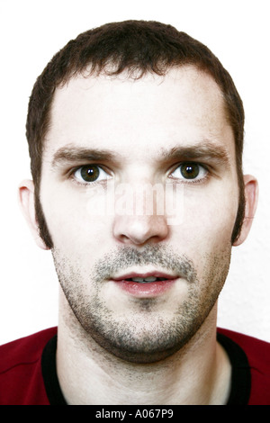A man with fair complexion looks at the camera Stock Photo - Alamy