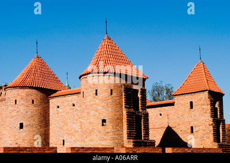 Barbican aka Barbakan medieval defence walls with towers and red tiles ...