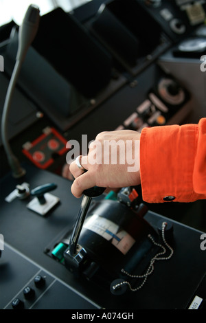Graphic shot of Tugboat captain using controls whilst manoevering by ...