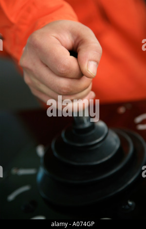 Graphic shot of Tugboat captain using controls whilst manoevering by ...