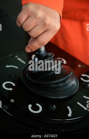 Graphic shot of Tugboat captain using controls whilst manoevering by ...
