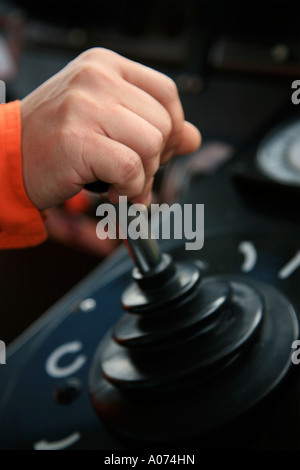 Graphic shot of Tugboat captain using controls whilst manoevering by ...
