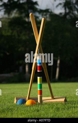 Set of croquet equipment on green grass, above view Stock Photo - Alamy