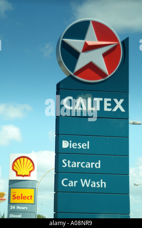 Shell petrol garage logo emblem sign blue sky Stock Photo - Alamy