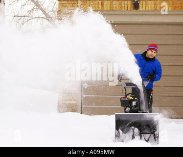 Old man using snow blower/snowblower Stock Photo - Alamy