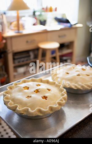 An unbaked peach pie Stock Photo - Alamy