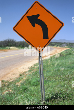 Diamond-shaped left bend directional road sign with curved arrow Stock ...