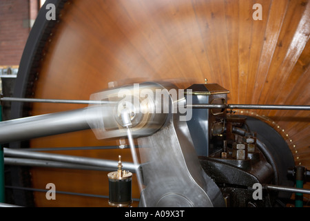 rotating flywheel and pistons on a restored steam engine Stock Photo ...