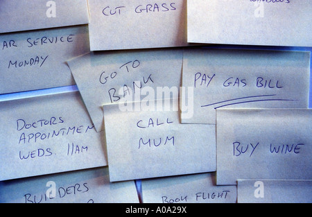 Multiple to-do notes stuck to a door / wall Stock Photo - Alamy
