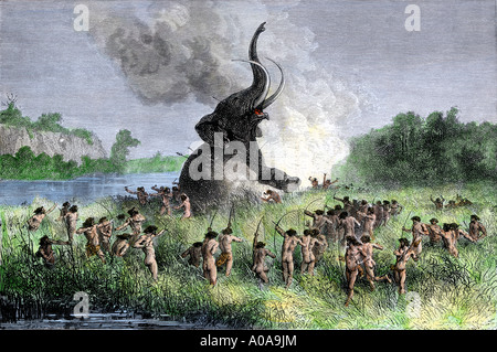 European cavemen hunting a mammoth, historic engraving of 1883 Stock ...
