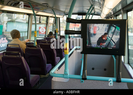 CCTV screen showing the inside of a bus in London Stock Photo - Alamy