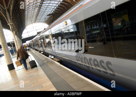 LONDON- Heathrow Express train on Platform inside Paddington Station ...