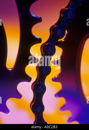 Synchronized gears connected Stock Photo - Alamy