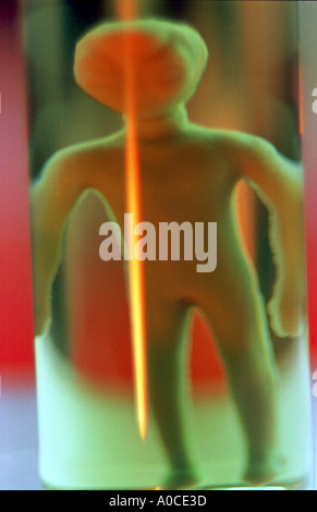 suspended alien figure Stock Photo - Alamy