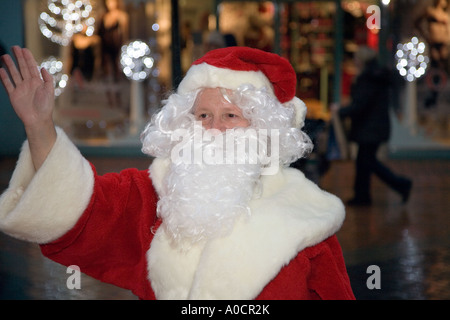 Father Christmas store greeter outside Debenhams in Perth High street ...