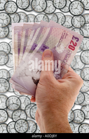 Cash in hand - bundle of sterling notes held in a hand UK money Stock ...