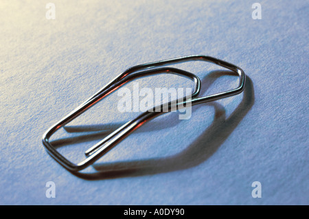 Bent paper clip Stock Photo - Alamy