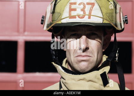 Portrait of frowning sad fireman Stock Photo - Alamy