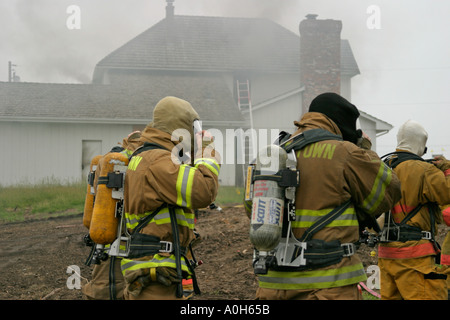Firefighters Preparing to Enter Burning Structure Stock Photo - Alamy