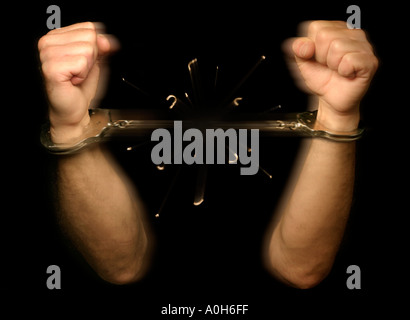 Breaking Free of Handcuffs Stock Photo - Alamy