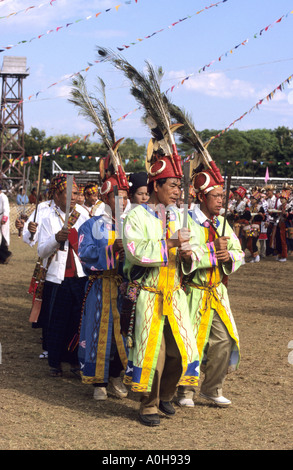 A tribal costume at Manau Dance, traditional ceremony of Kachin people ...