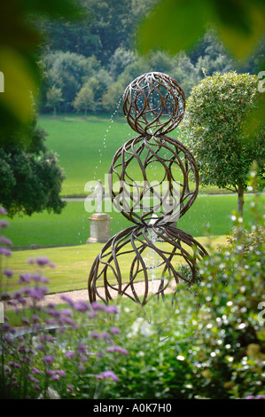 THE TOPIARY WATER SCULPTURE BY GILES RAYNER IN THE MILLENNIUM GARDEN AT ...