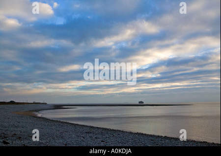 Offshore caisson in Limpert Bay at Aberthaw Power Station at sunset ...
