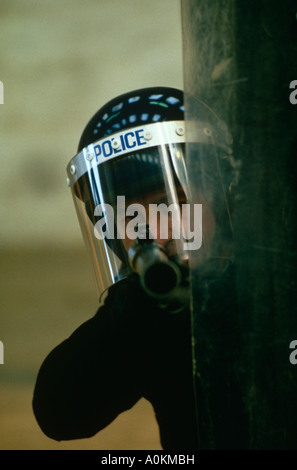 Metropolitan police public order training instructors demonstrating ...