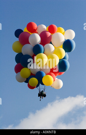 Cluster balloonist in flight Stock Photo - Alamy