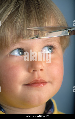 young child having hair cut Stock Photo - Alamy