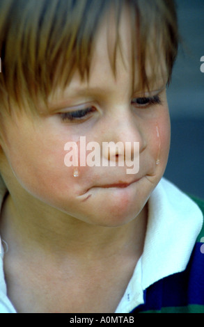 Grade school boy crying St Paul Minnesota Stock Photo - Alamy