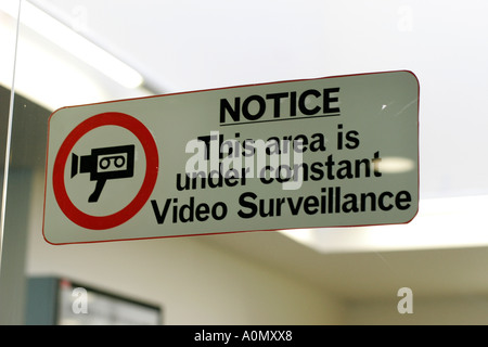 A security sign at an Airport terminal warns of a restricted area Stock ...