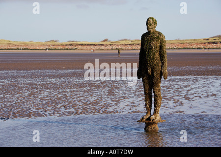 Anthony Gormley's bronze sculptures Crosby beach near Liverpool England ...