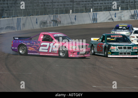 Racing pick up truck spinning out Stock Photo - Alamy