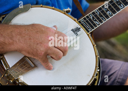 Hand of a man playing a banjo Stock Photo - Alamy