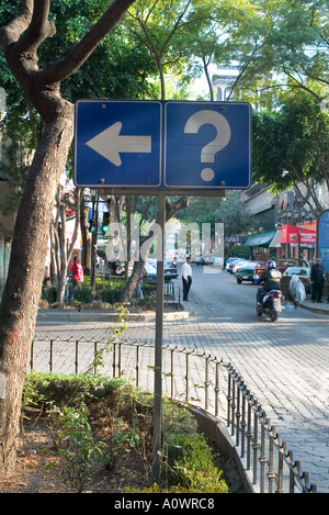 One way road sign and question mark on the streets of Mexico City Stock ...