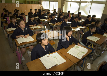 Japanese children seated at desks in a school in Tokyo, Japan, 1946 ...