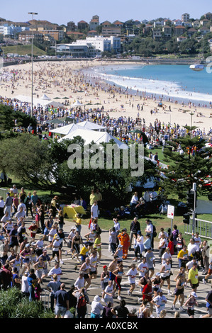Competitors in the annual City to Surf race at the finish in Bondi ...