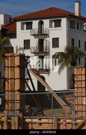 This is a vertical stock image of city construction of a high rise ...