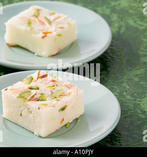 Close-up of Burfi in saucers Stock Photo - Alamy