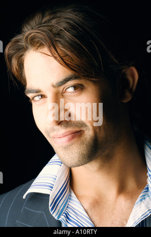 Portrait of a young man grinning Stock Photo - Alamy