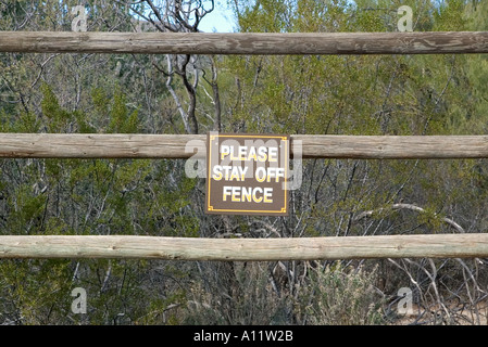Please stay off the fence sign Stock Photo - Alamy